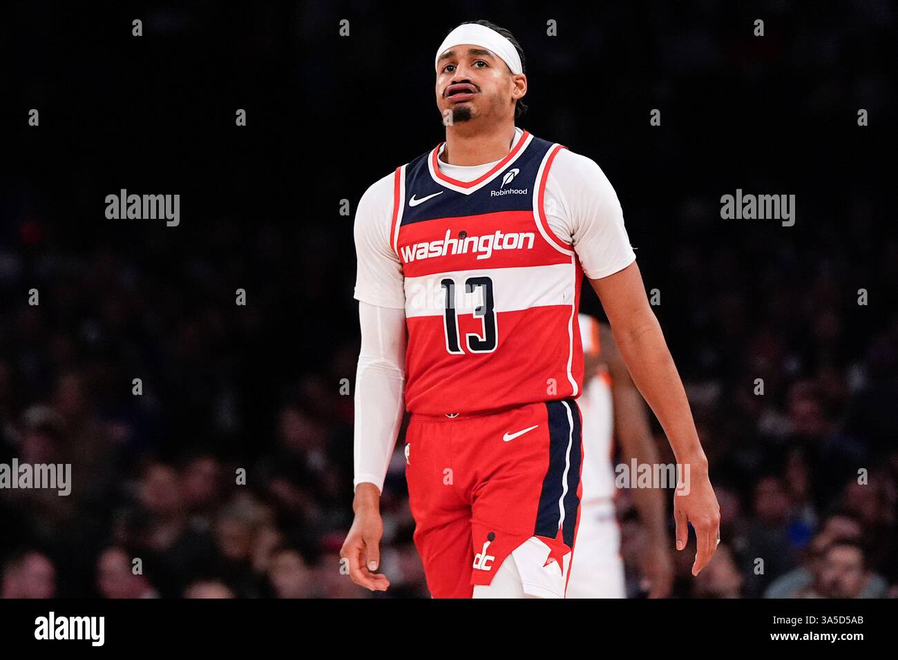 Washington Wizards guard Jordan Poole reacts during the first half of ...
