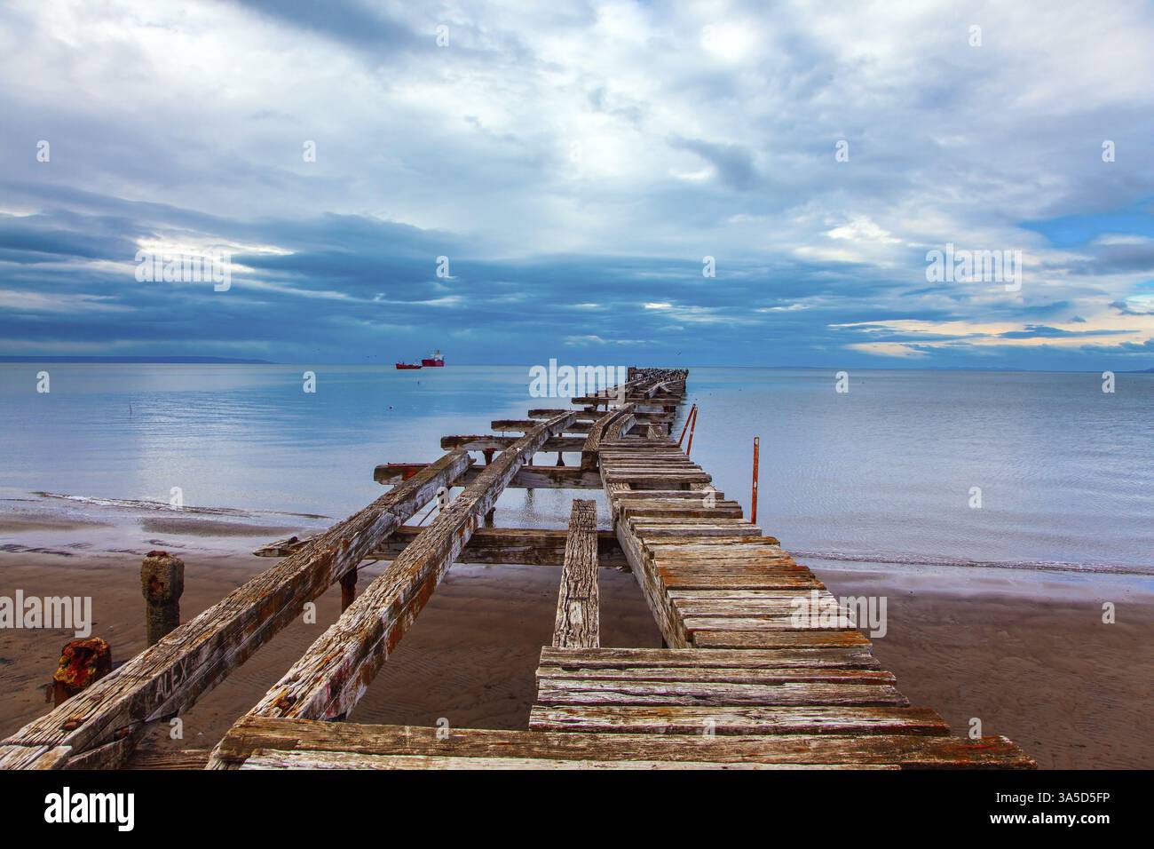 South America. Ruined ocean pier in Punta Arenas. The wooden dock ...