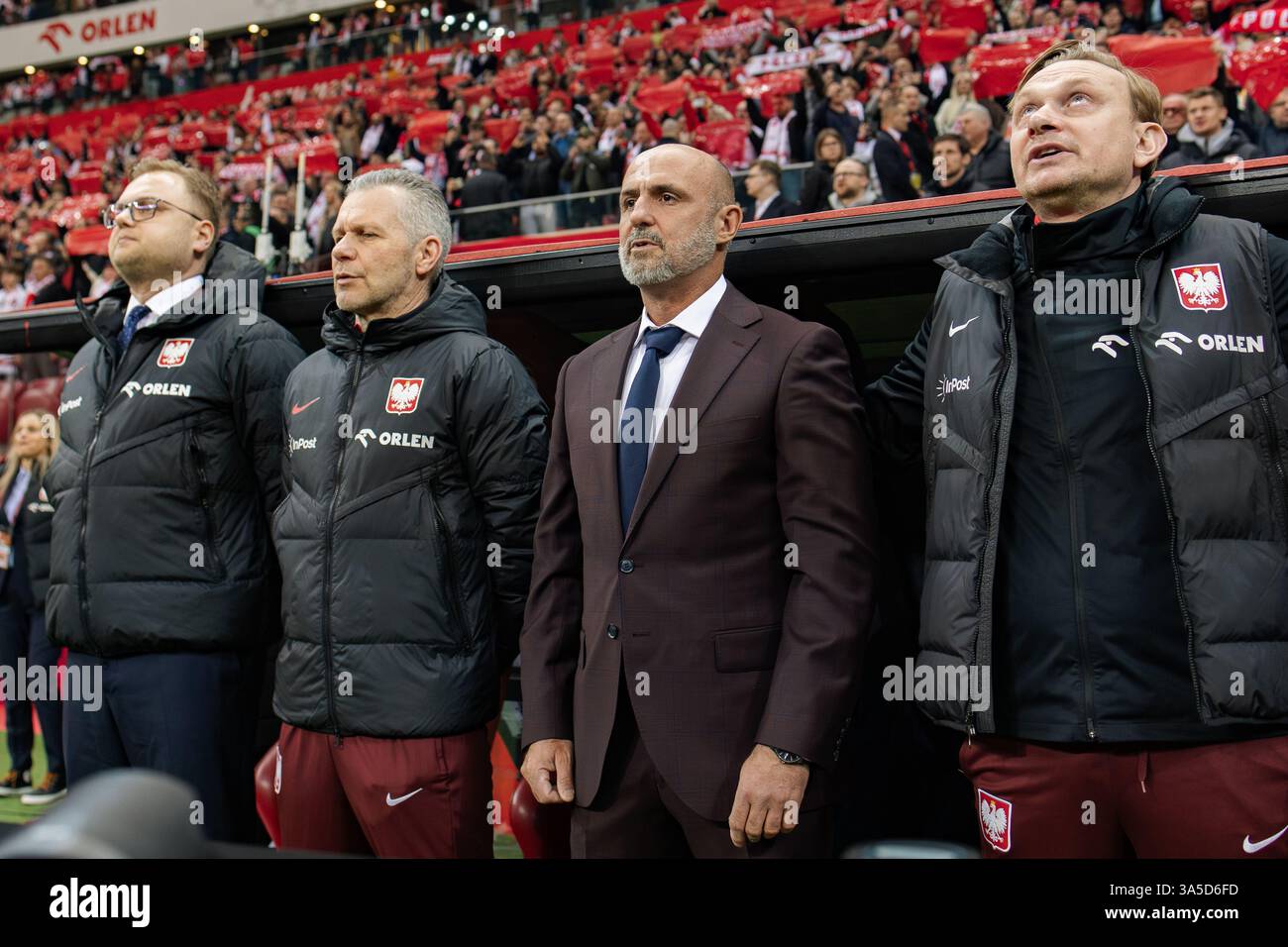 Warsaw, Poland. 21st Mar, 2025. (L to R) Lukasz Gawrjolek (team manager ...