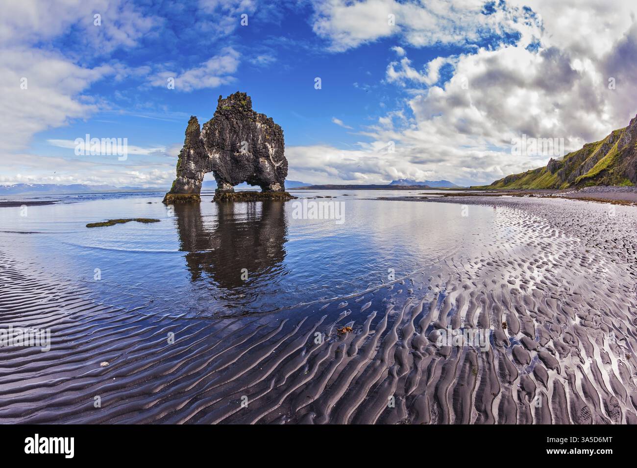 Stone mammoth Iceland. The picturesque cliff in Bay of Hoonah during ...