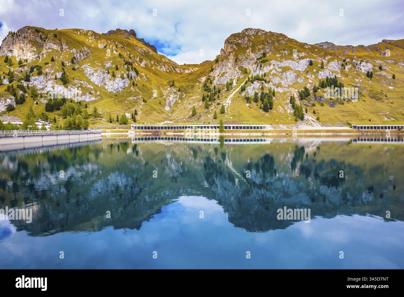 Mountain Lake Lago di Fedadia, Dolomites. Glacial lake with clear cold ...