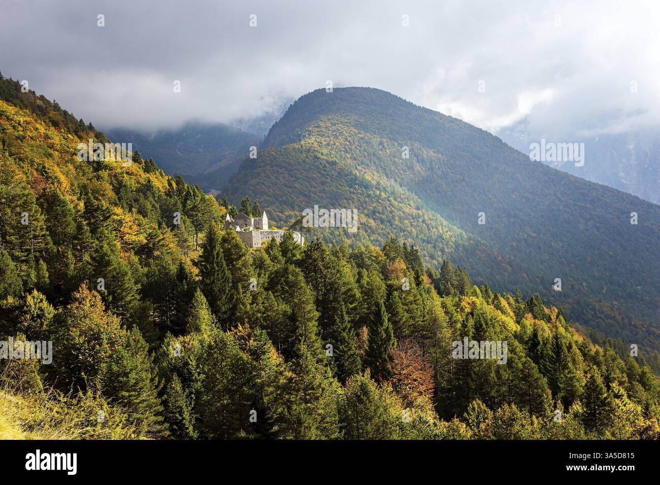 Travel to Slovenia. Ruins of a medieval castle on a mountainside. The ...