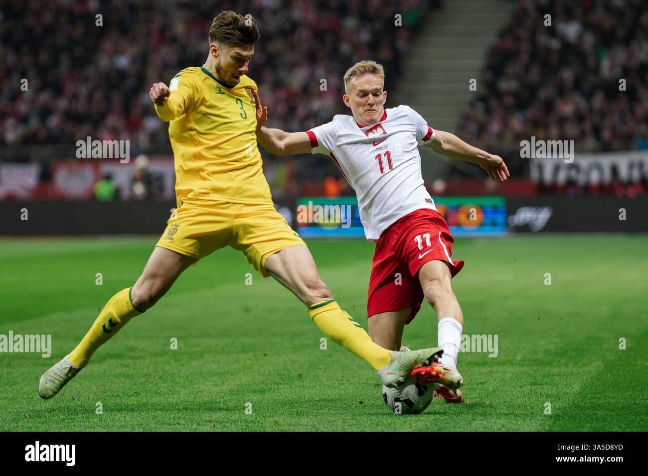 Edgaras Utkus (L) of Lithuania and Karol Swiderski (R) of Poland are ...