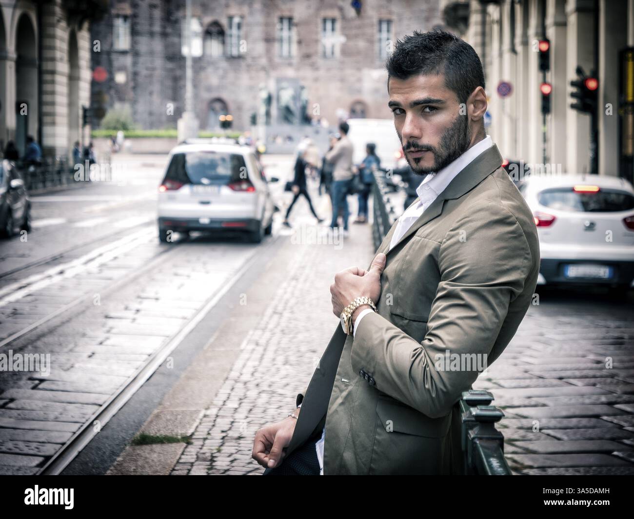 Attractive man outdoor wearing elegant jacket, in European city, Turin ...