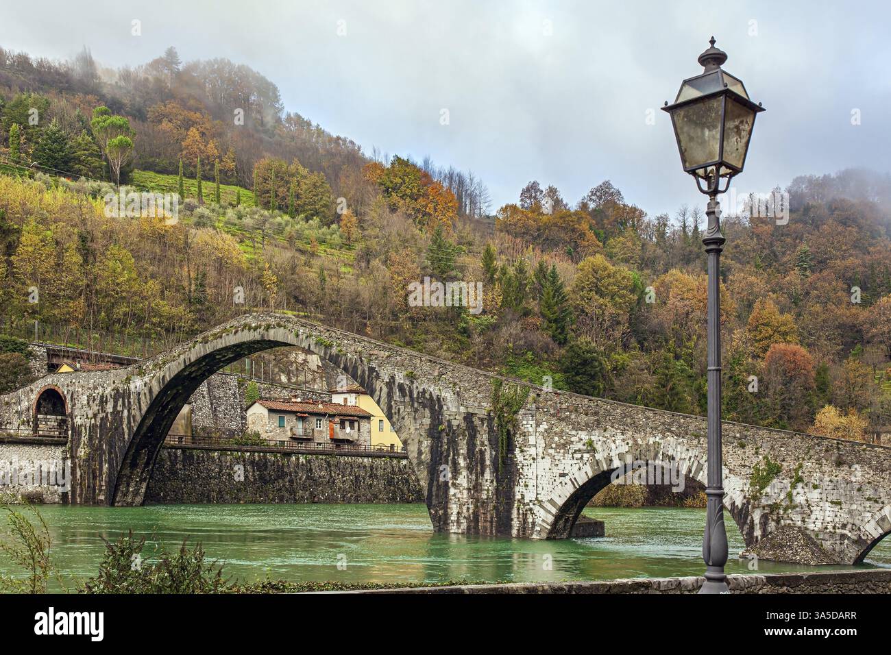Picturesque stone Devil's Bridge over the Serchio River. Medieval ...