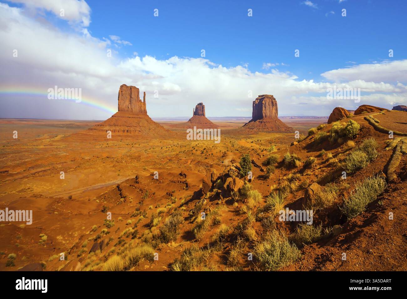 The USA. Magnificent rainbow across the sky. Monument Valley is unique ...