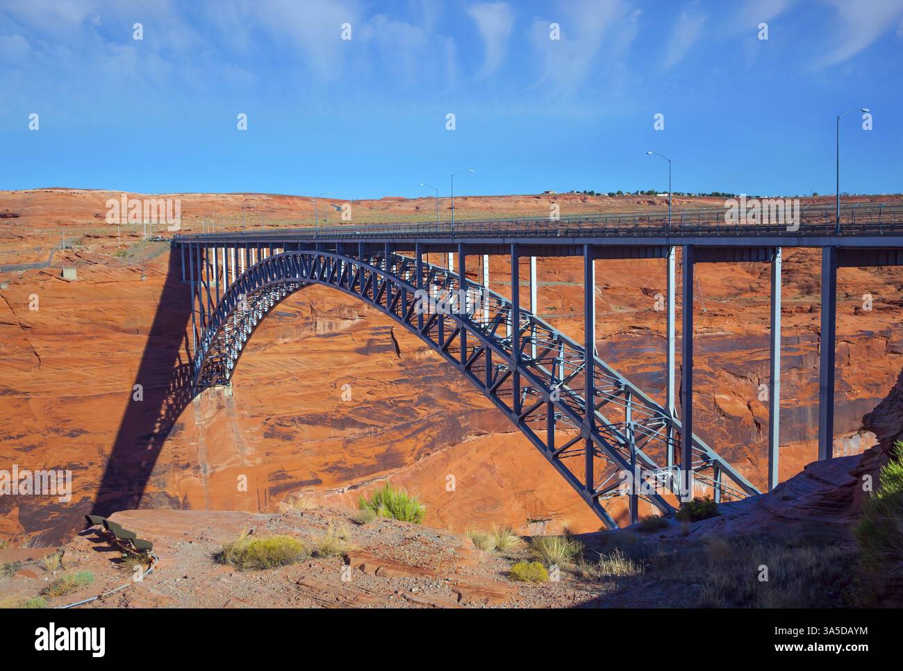 Picturesque red sandstone is the base of the bridge. Arched bridge from ...