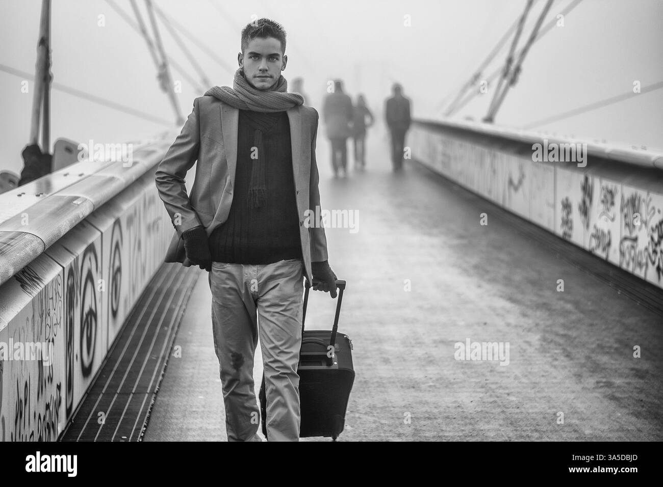 Trendy handsome man walking Black and White Stock Photos & Images - Alamy