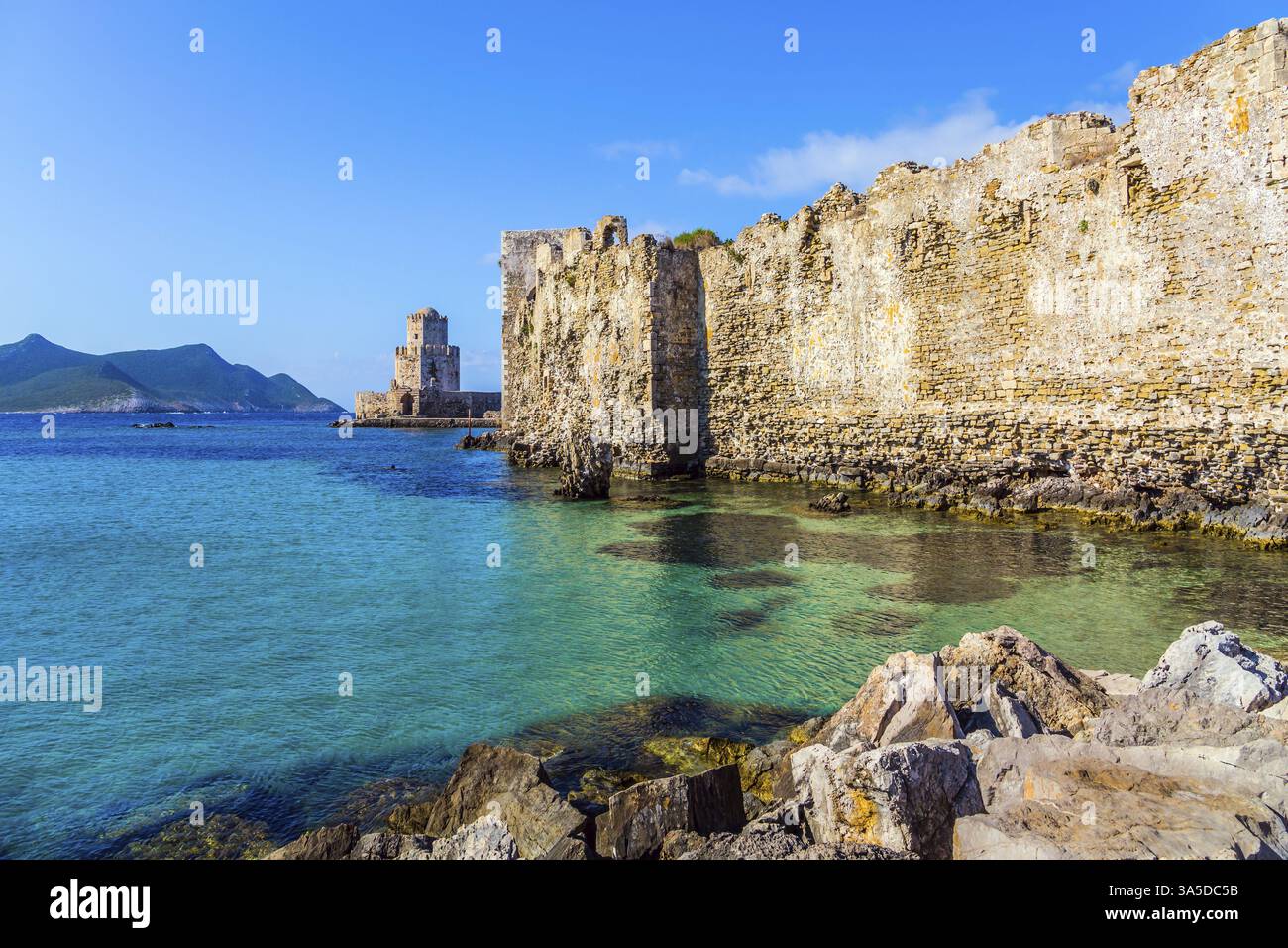 The watchtower is built on long cape in the sea. Sea shoal beautiful ...