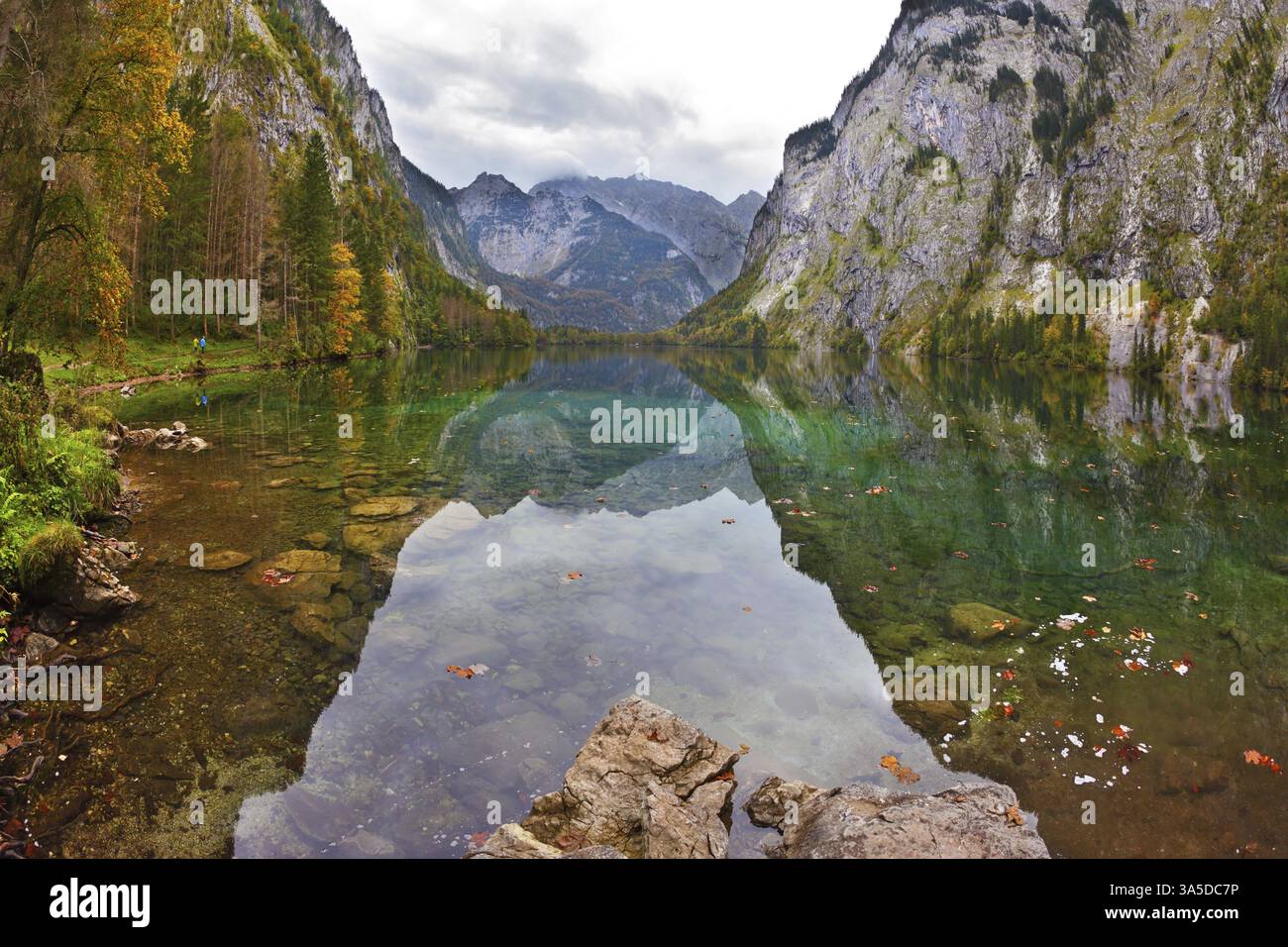 Cloudy day on the lake. Magic reflection in German lake Koenigssee ...