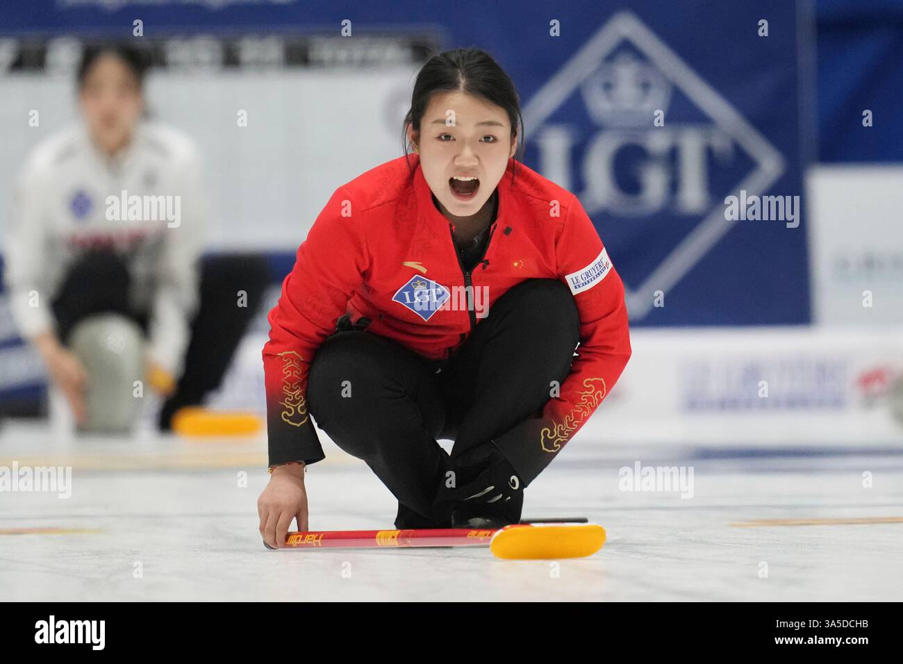 China's Han Yu calls the sweep during the bronze medal match against South Korea at the World ...