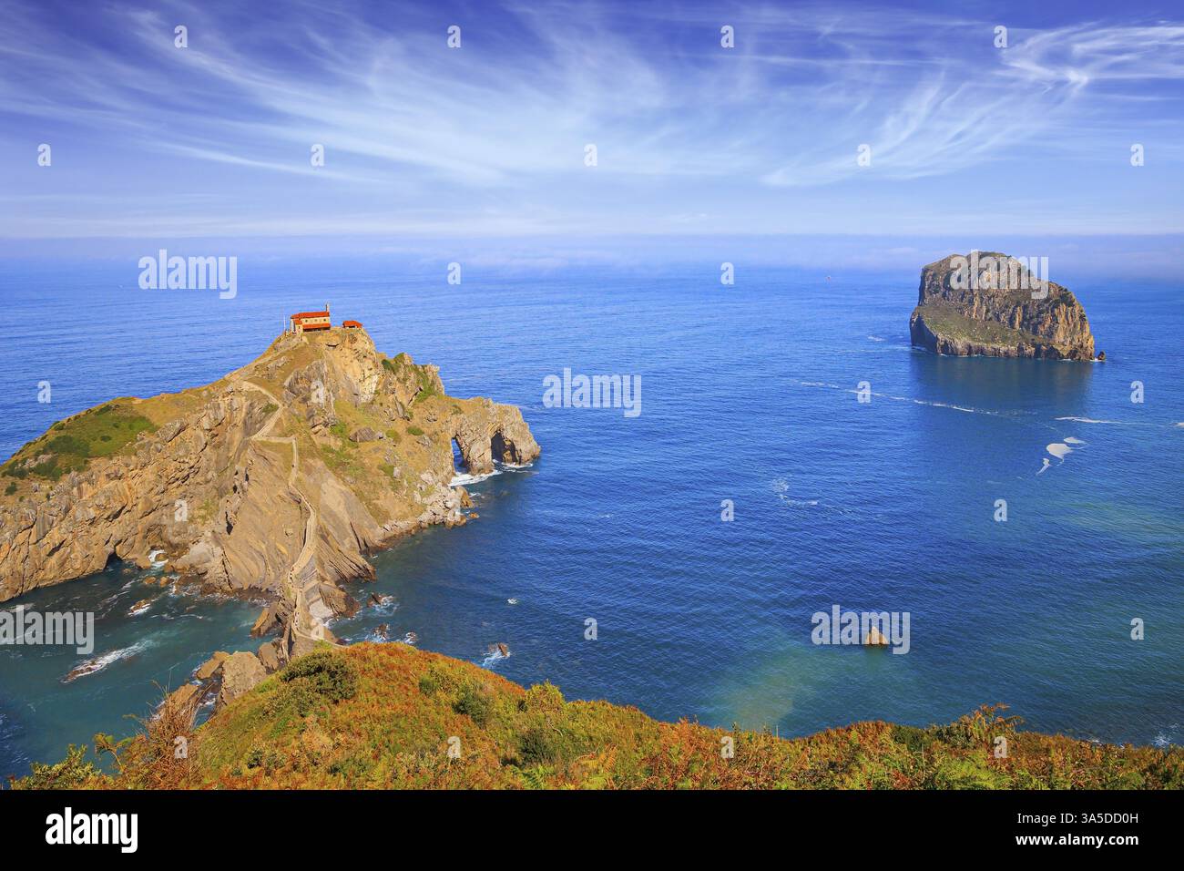 The island Gastelugache is connected to the mainland by bridge and ...