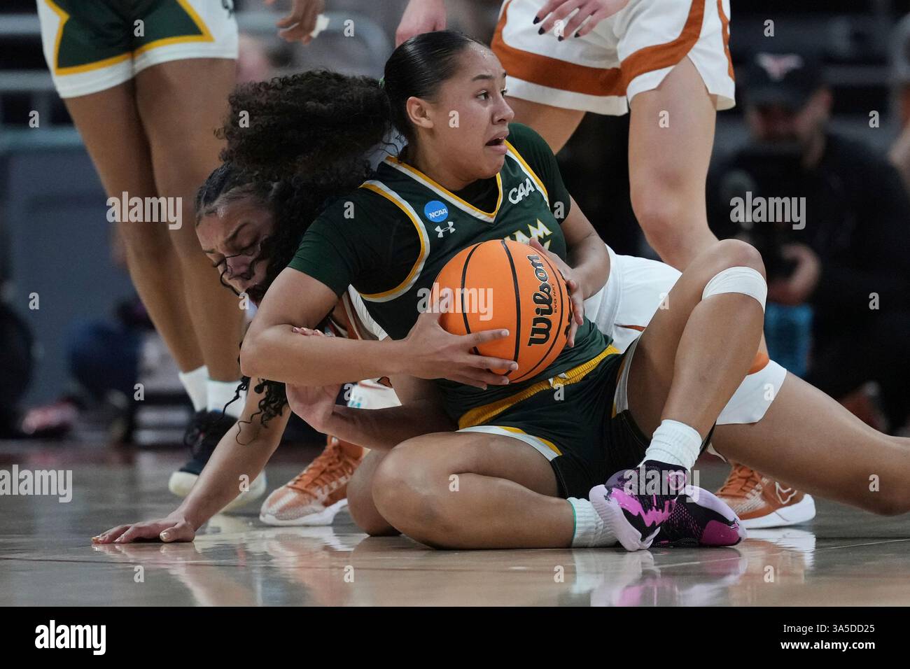 William & Mary guard Cassidy Geddes, right, and Texas guard Jordan Lee ...