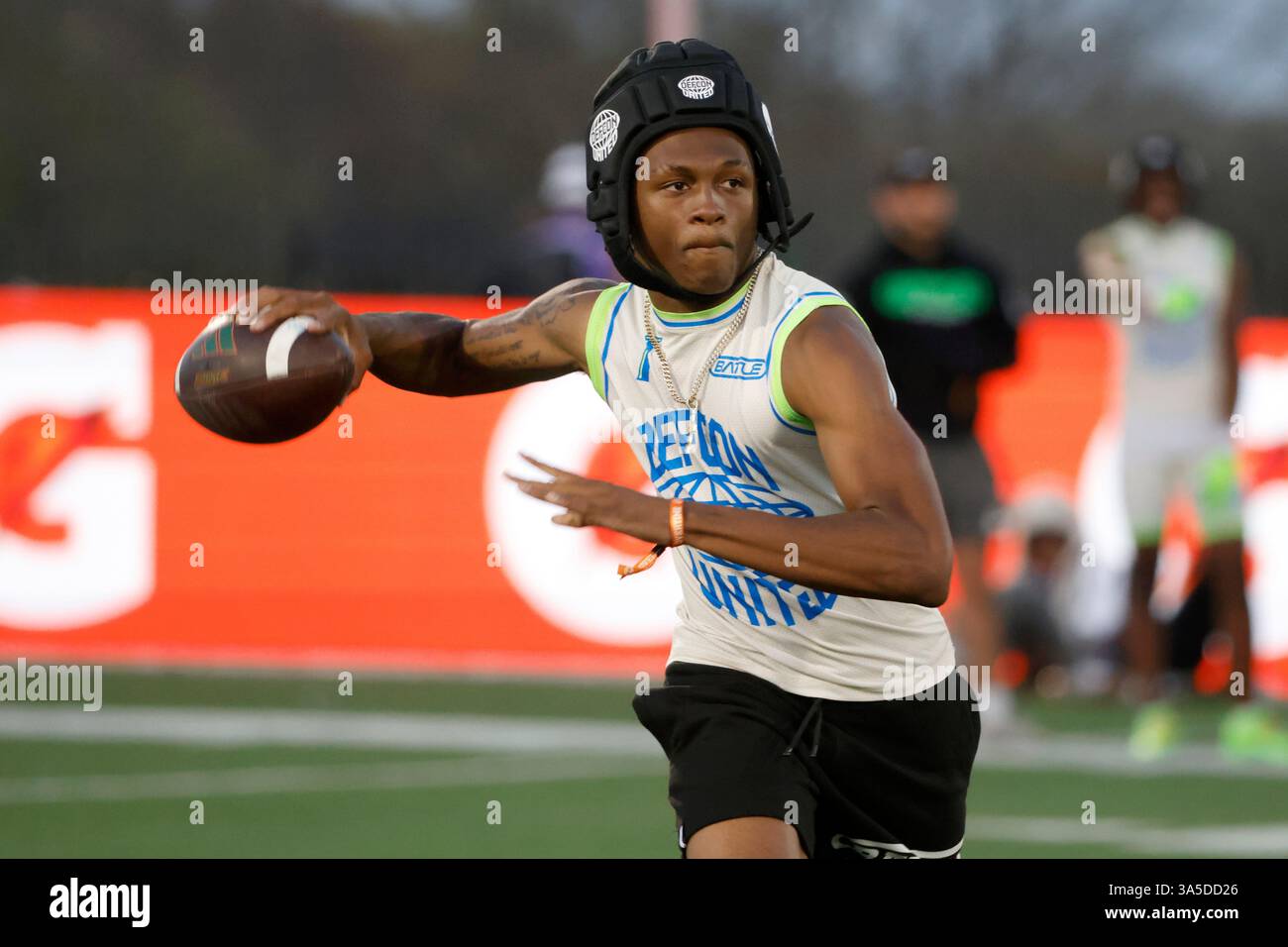 Defcon United quarterback Dereon Coleman looks to throw a pass against ...