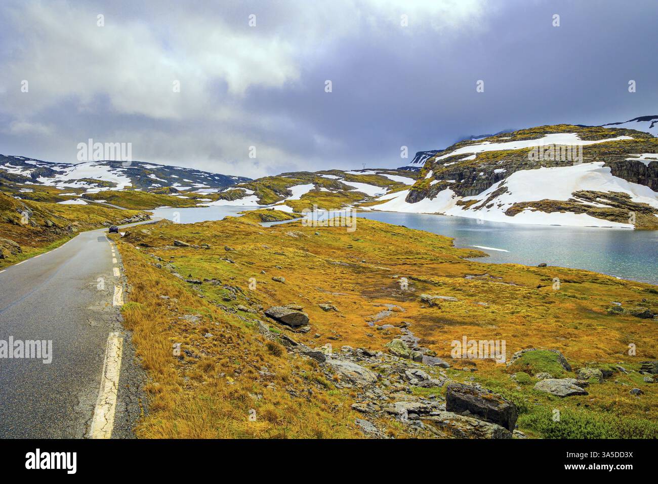 Snow road. Incredible trip to the north of Norway in cold July. Heavy ...