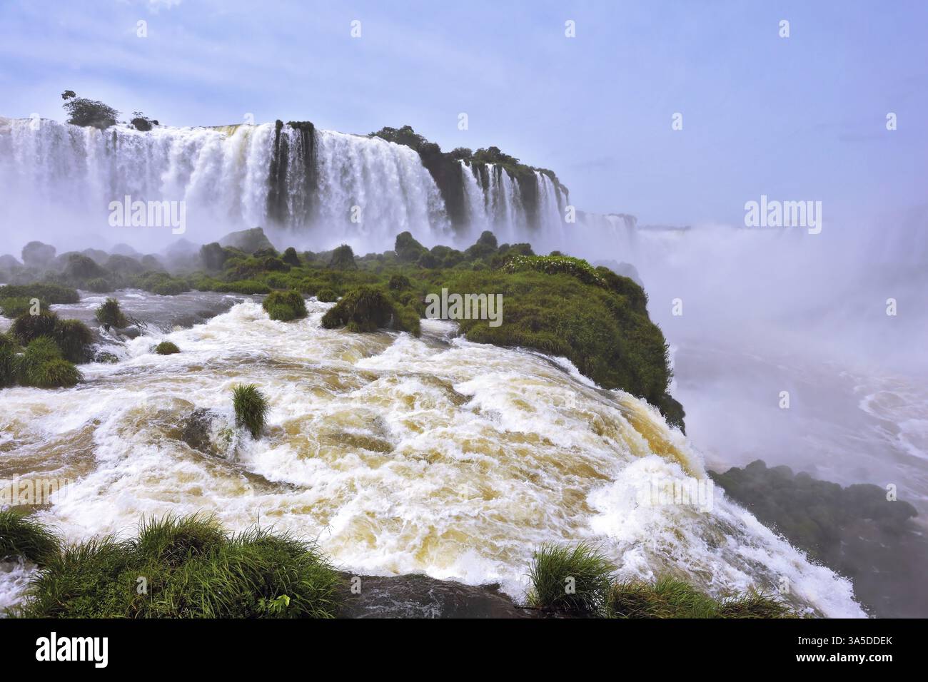 The grand Iguazu Falls on the Brazilian side. Multi-tiered cascades of ...