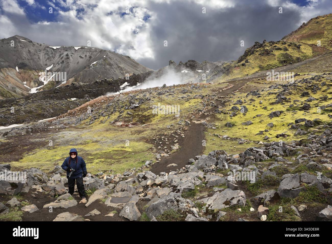 Rhyolite mountains smoldering underground heat. In the hollows lie ...