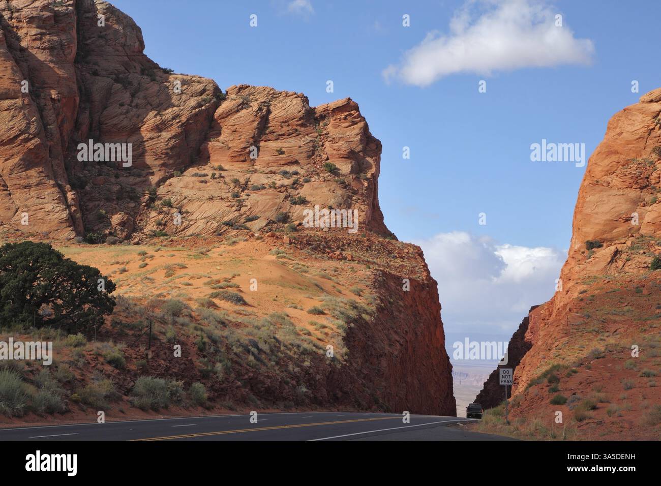 Magnificent American road among rocks of red sandstone Stock Photo - Alamy