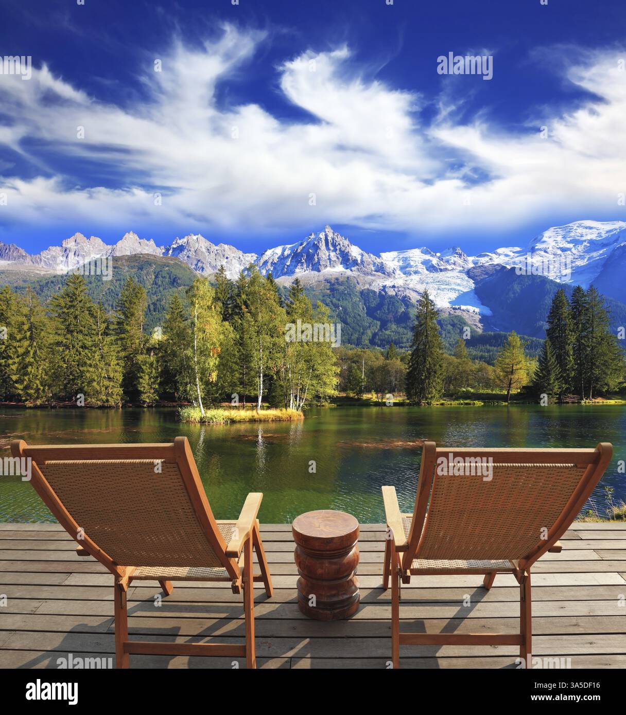 Comfortable lounge chairs on wooden platform for rest and observation ...