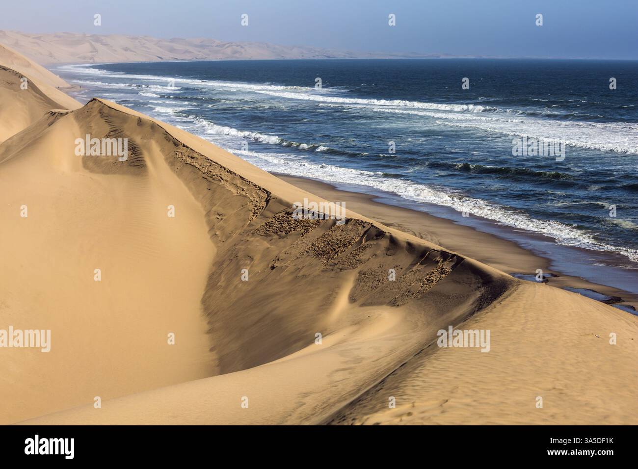 Atlantic coast of Walvis Bay, Namibia, south of Africa. Ocean surf with ...