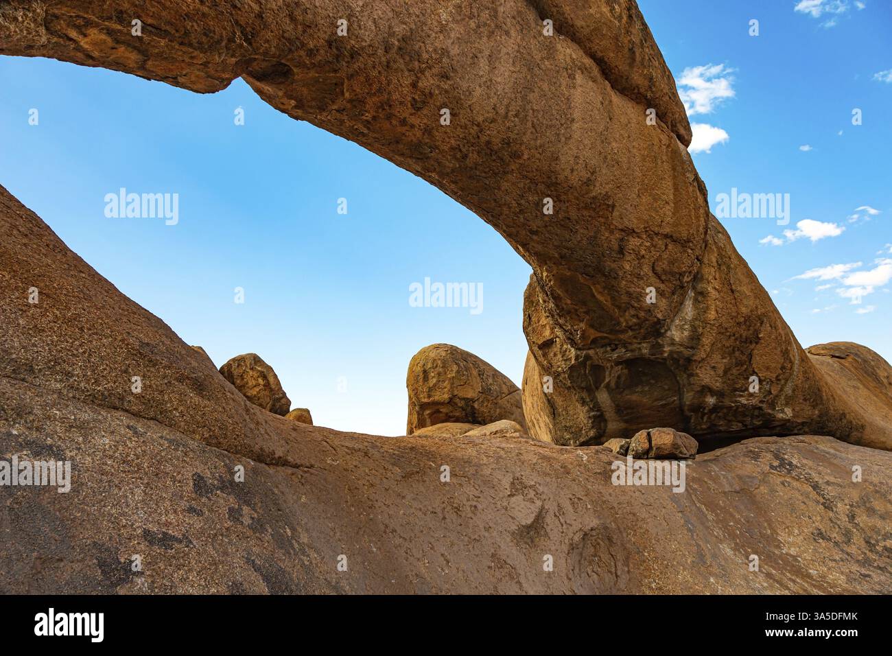 Spitzkoppe is picturesque rock massif in Namibia. Huge rounded boulders and arches in the middle ...