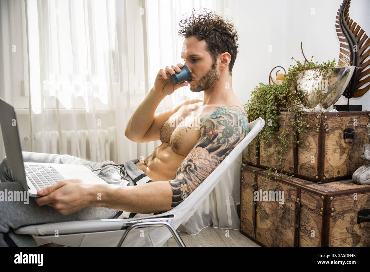 Waist Up Profile of Attractive Man with Muscular Body, Sitting with ...