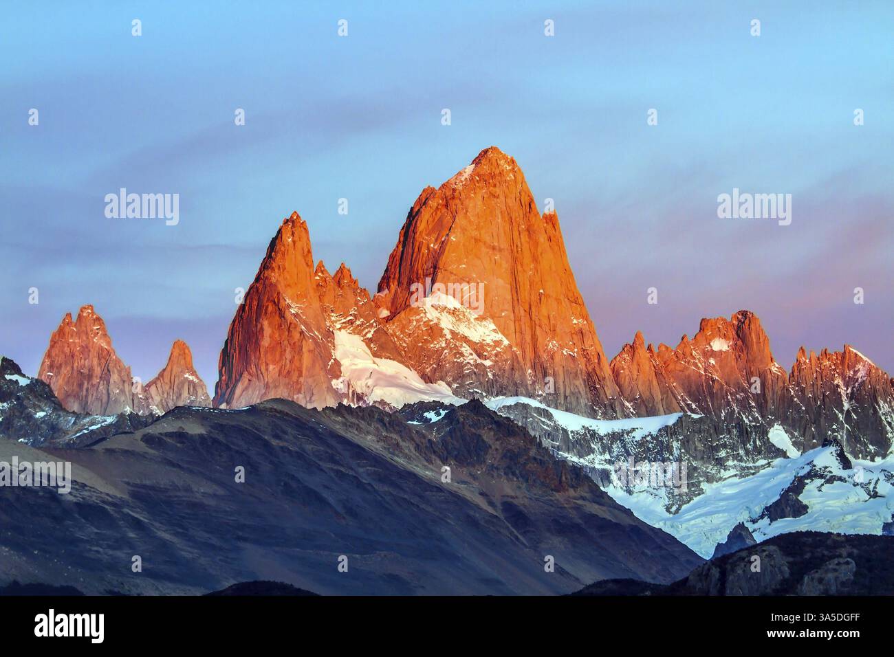 Mountain peak in Patagonia. The grand crimson dawn over the mountain ...