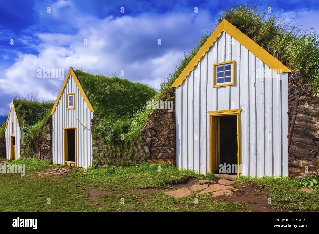Houses are roofed by the turf and grass. The recreated village - museum ...