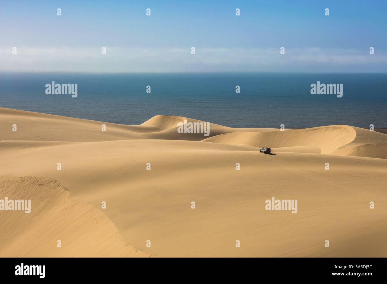Magical jeep - safari through the sand dunes on the ocean coast ...