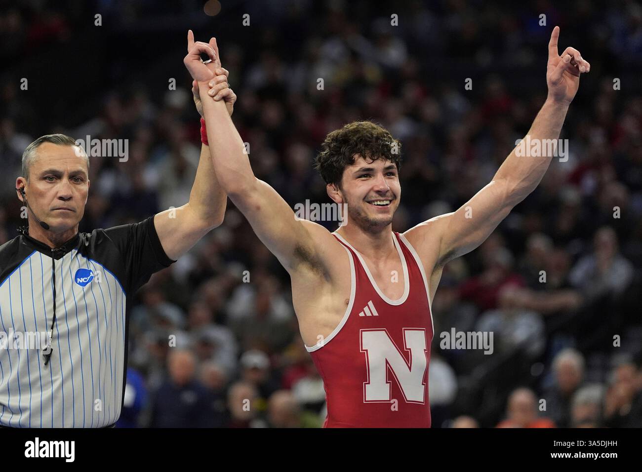 Nebraska's Ridge Lovett reacts after defeating Virginia Tech's Caleb ...