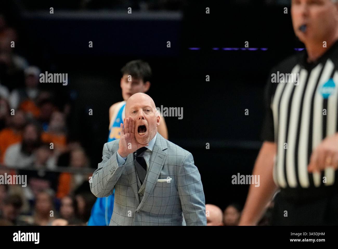 UCLA coach Mick Cronin yells towards a referee during the first half in ...