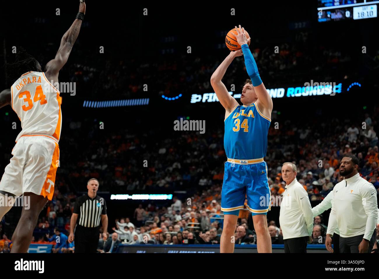 UCLA forward Tyler Bilodeau (34) shoots against Tennessee forward Felix ...