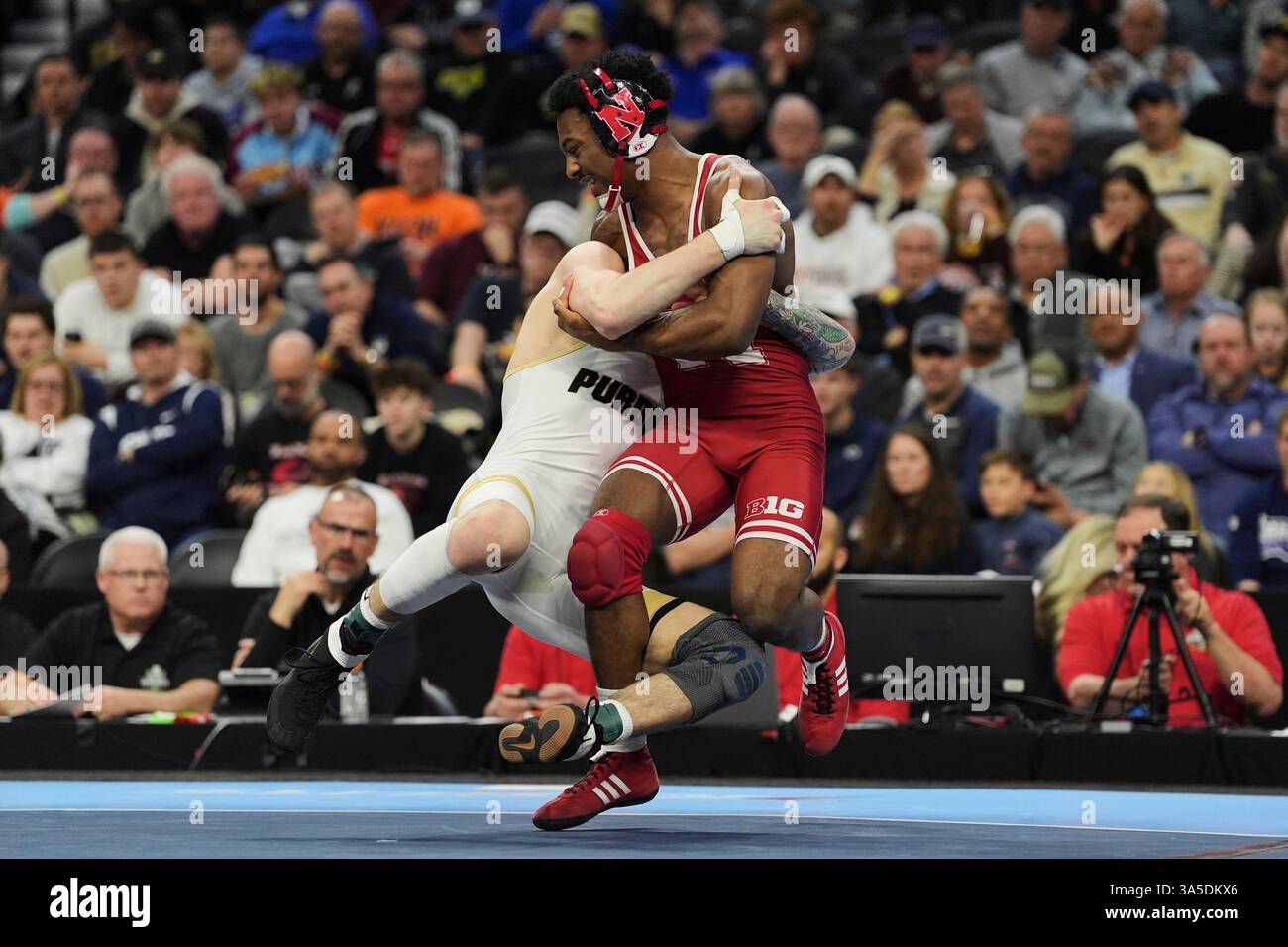 Nebraska's Antrell Taylor, right, takes on Purdue's Joey Blaze in their ...