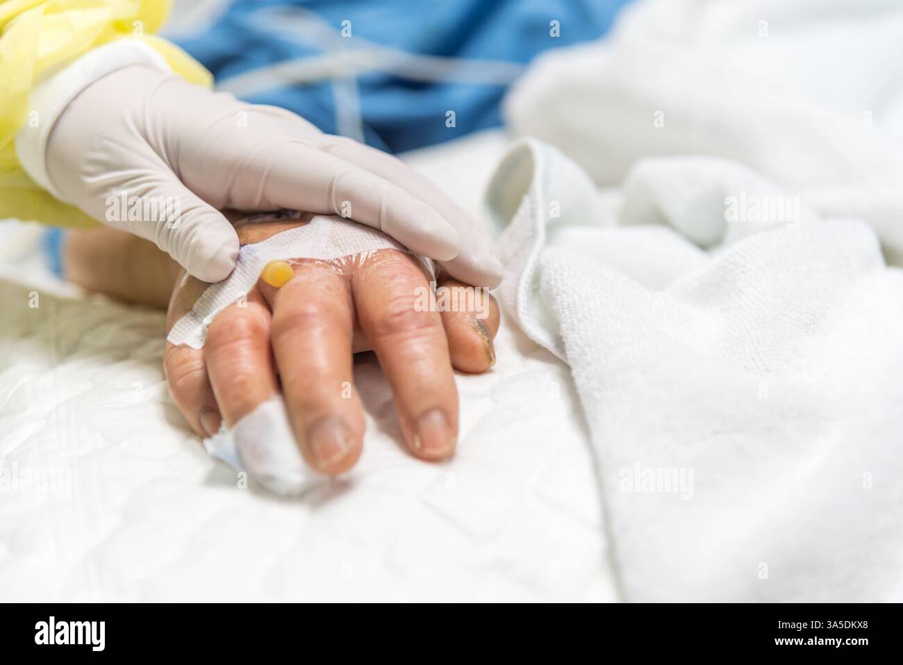 Patient in the hospital with saline intravenous and relatives patient ...