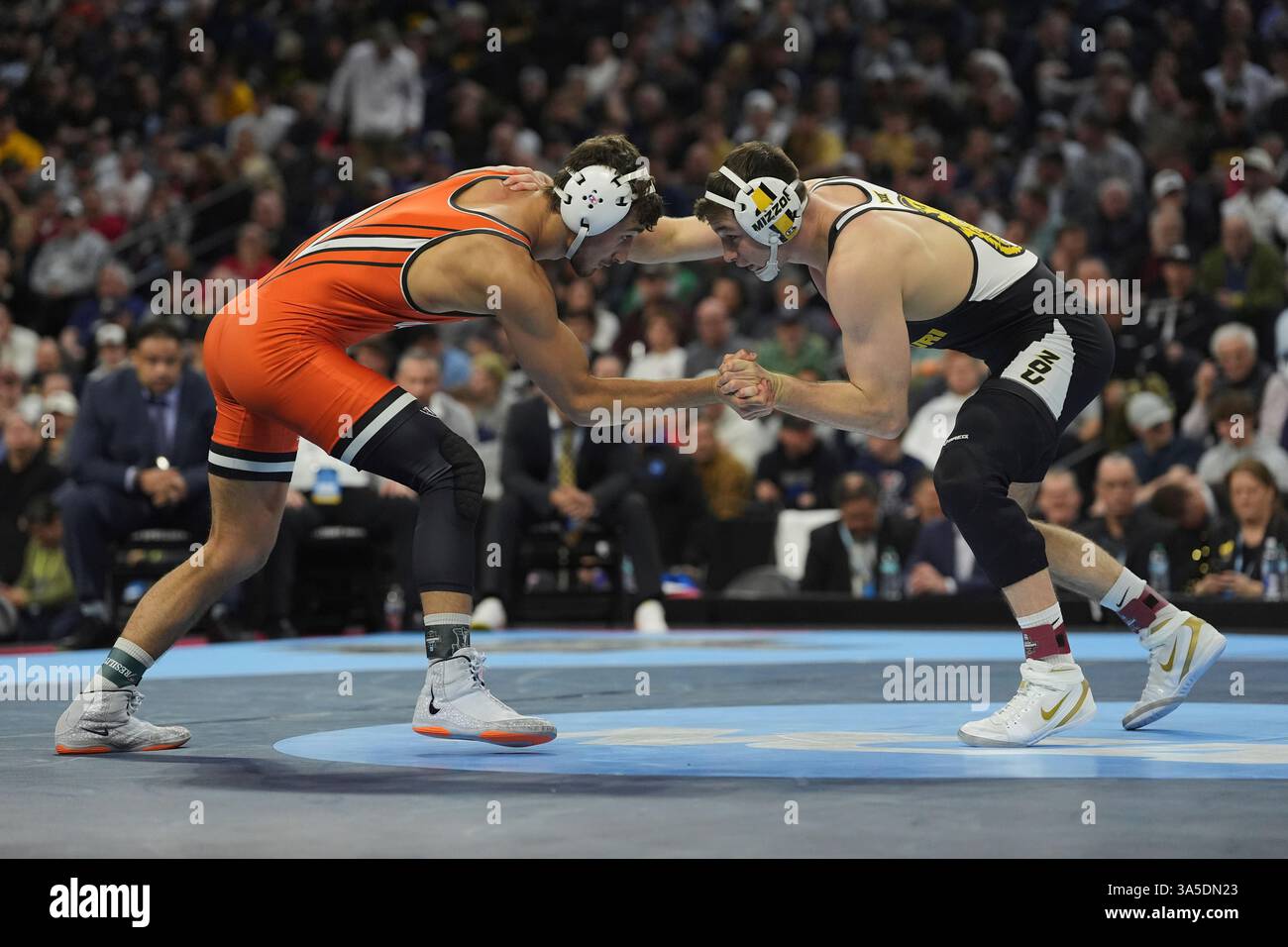 Oklahoma State's Dean Hamiti, left, takes on Missouri's Keegan O ...
