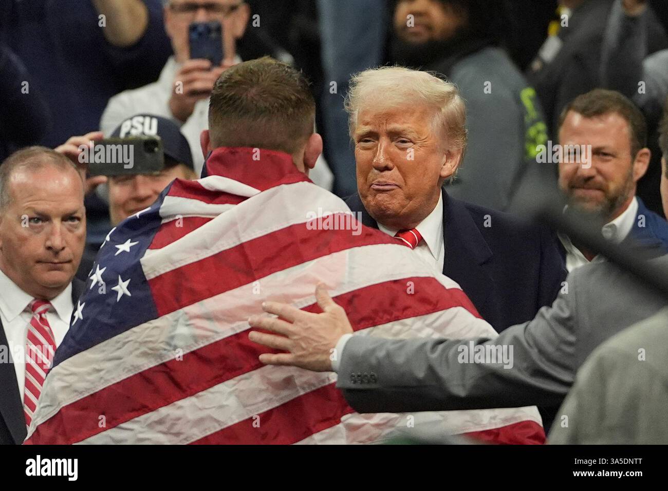 President Donald Trump, greets Oklahoma State's Wyatt Hendrickson ...