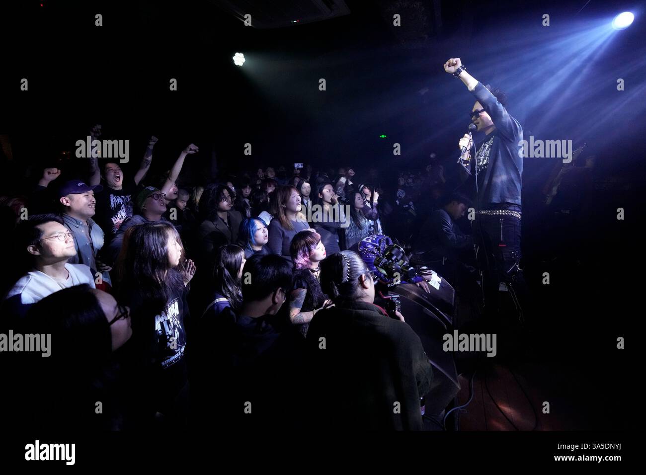 Chinese punk band Gum Bleed lead singer Dee performs during a punk ...