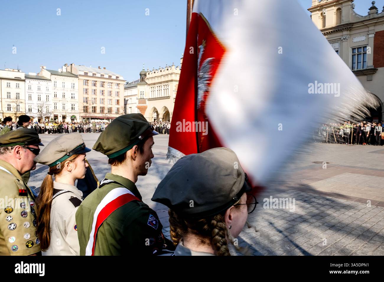 Scouts hold Polish flag as they participate in ceremonial gathering of ...