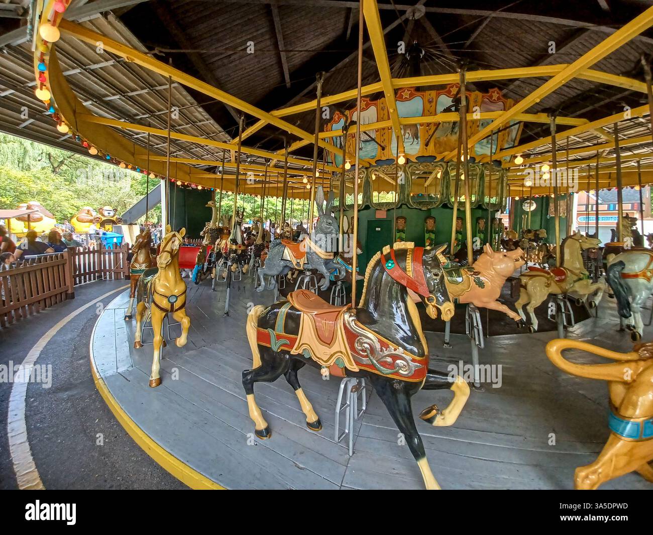 Toronto, ON, Canada – August 08, 2024: A classic carousel with colorful ...