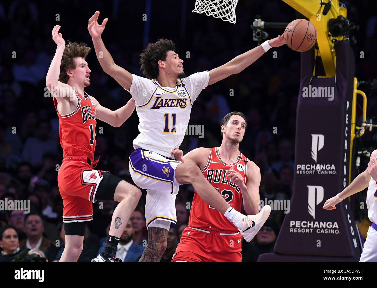 Los Angeles Lakers center Jaxson Hayes (11) battles for a rebound with Chicago Bulls forwards ...