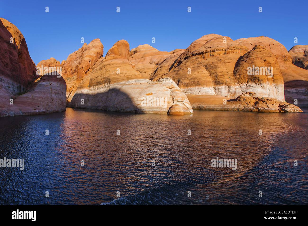 Sunset. Grandiose cliffs - red sandstone outcroppings. Tour on a ...