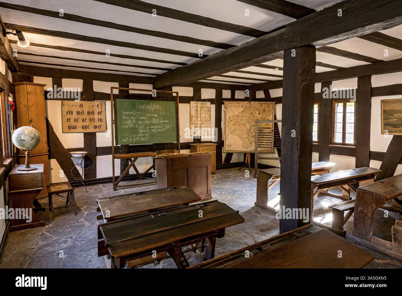 Classroom with blackboard and school desk, historical school, interior ...