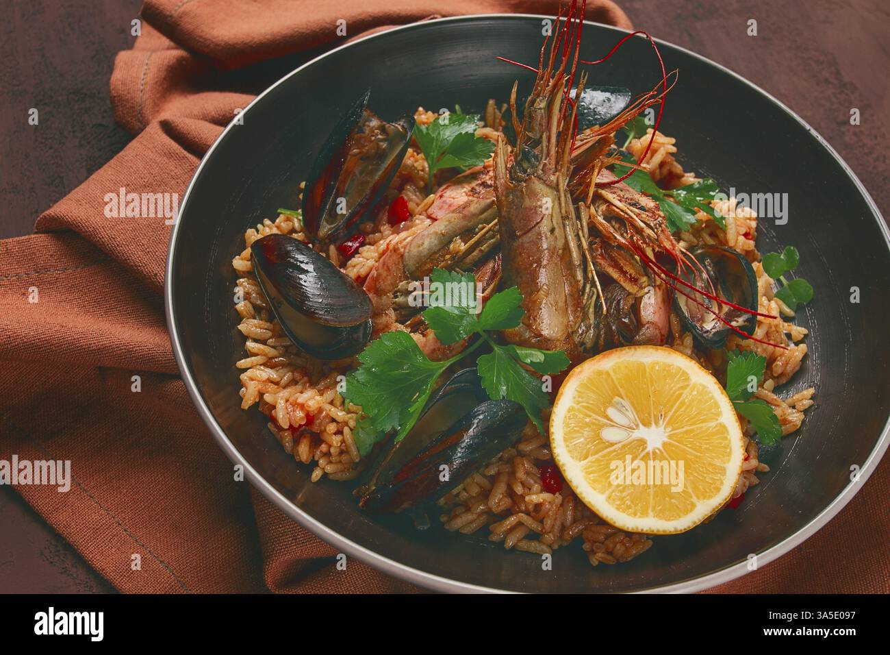 Seafood paella, shrimp and mussels risotto, rice, homemade, top view ...