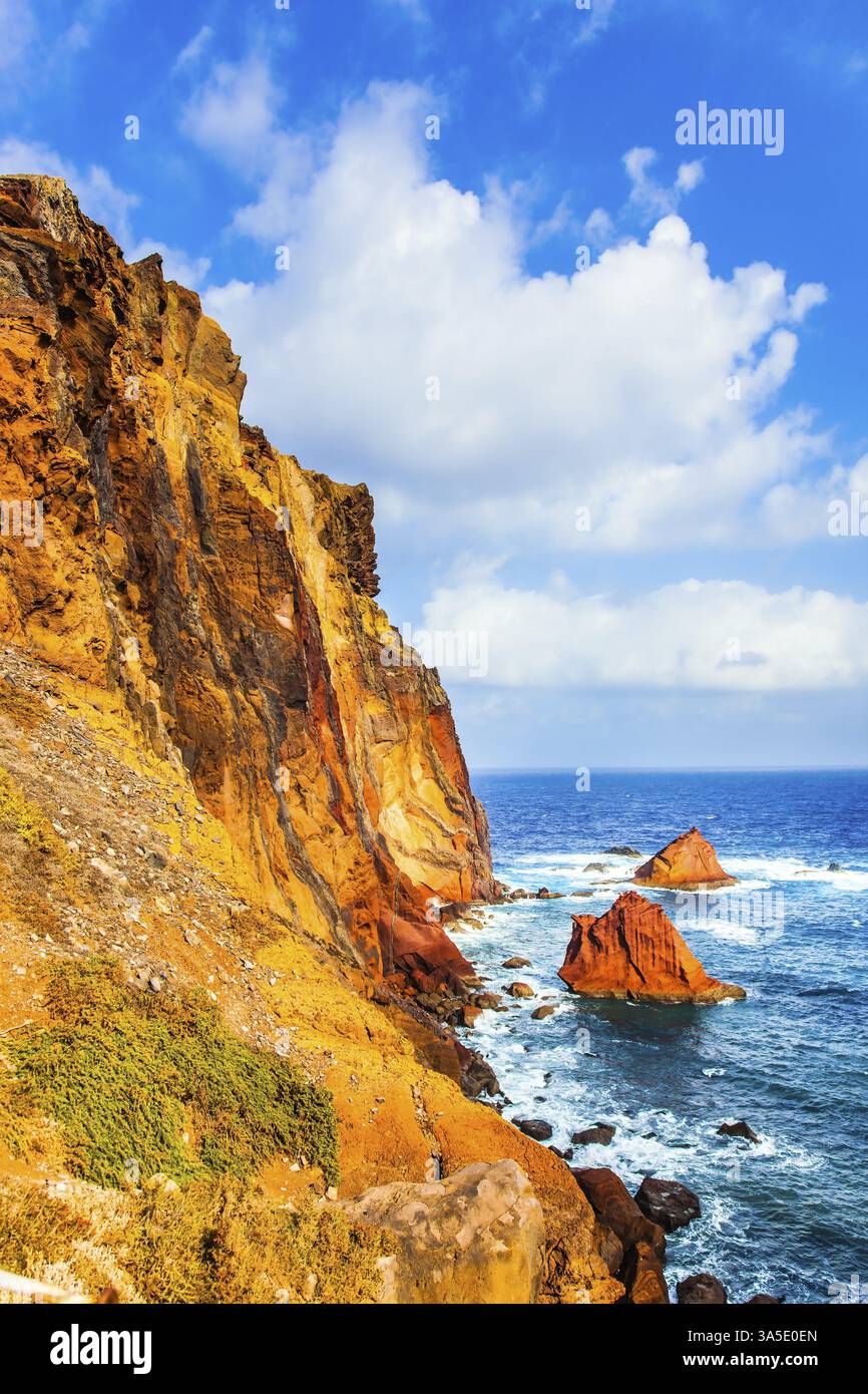The blinding midday sun illuminates the rocky shore. The boiling ...