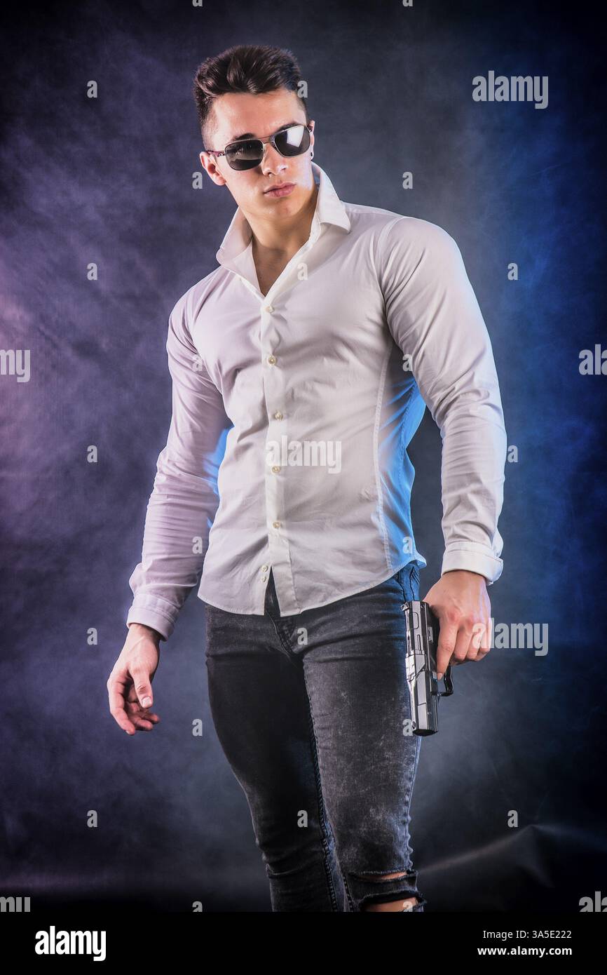 Man pointing gun hi-res stock photography and images - Alamy