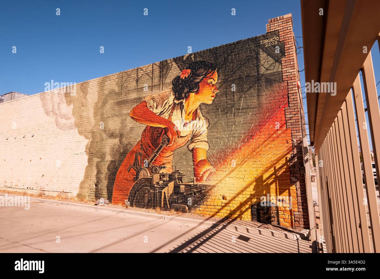 Colorful mural celebrating women industrial workers during World War II ...