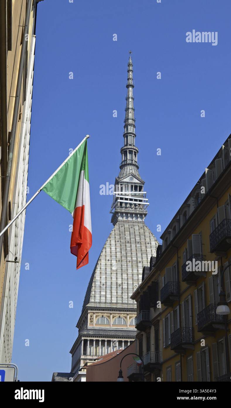 Mole Antonelliana in Turin Italy and italian flag in a clear day with ...