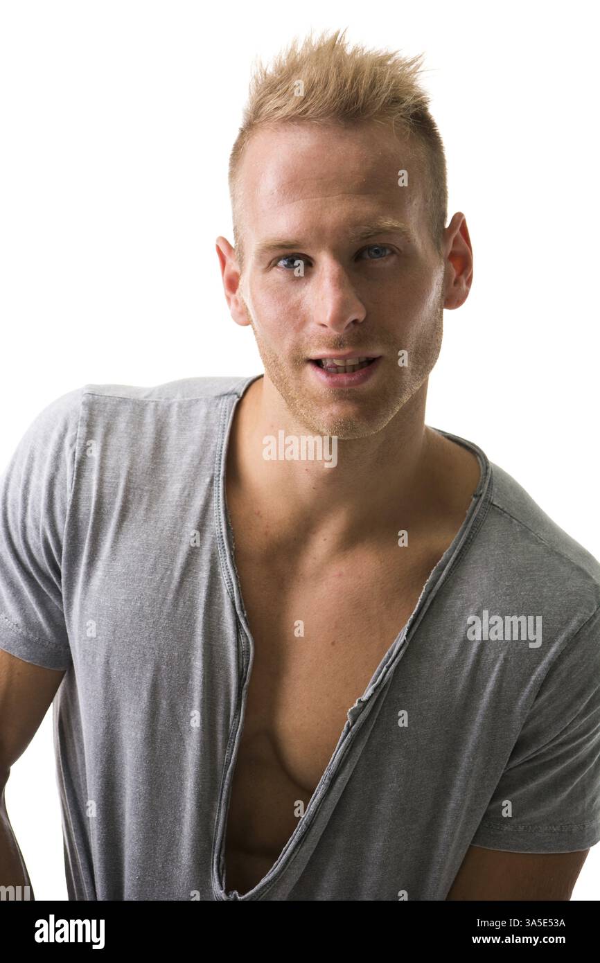 Fit male model smiling with a lot of confidence wearing grey t-shirt ...