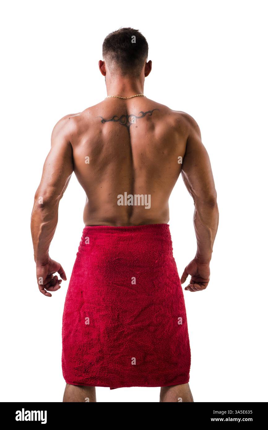 Hunk with towel around his neck back view on white background Stock ...