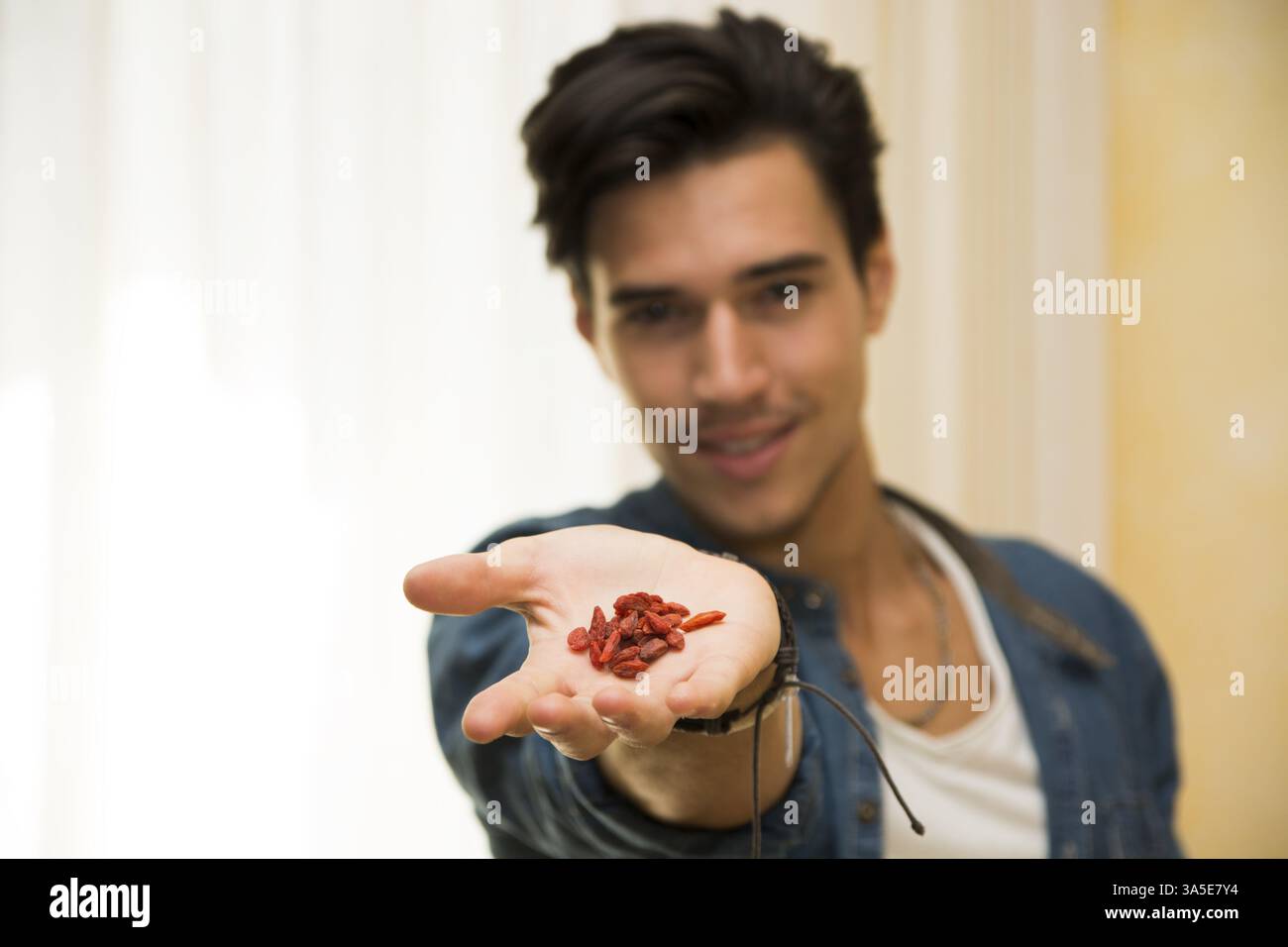 Showing them to the camera focus on the fruits hi-res stock photography ...